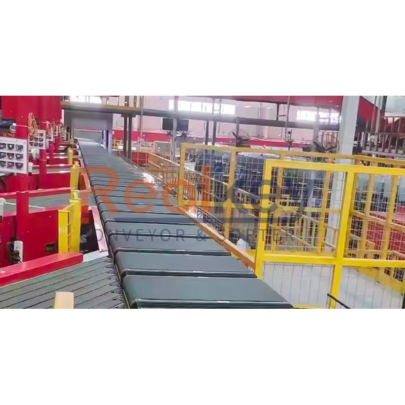 Close-up view of cross belt sorter mechanism