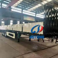 Quality 9.00-22.5 Rim Tri Axles Drop Side Wall Semi Trailer for Cargo Transport in for sale