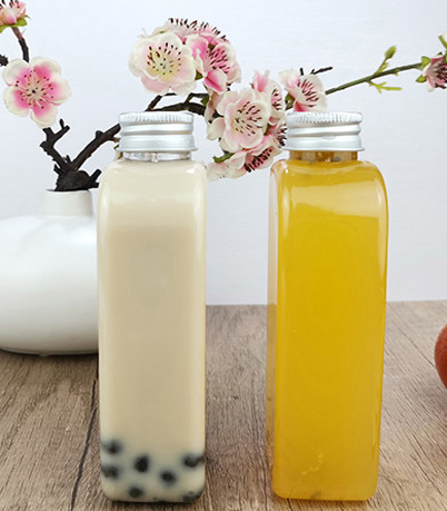 Quality Juice Milk 400ml Flat Plastic Drinking Bottles With Cap for sale