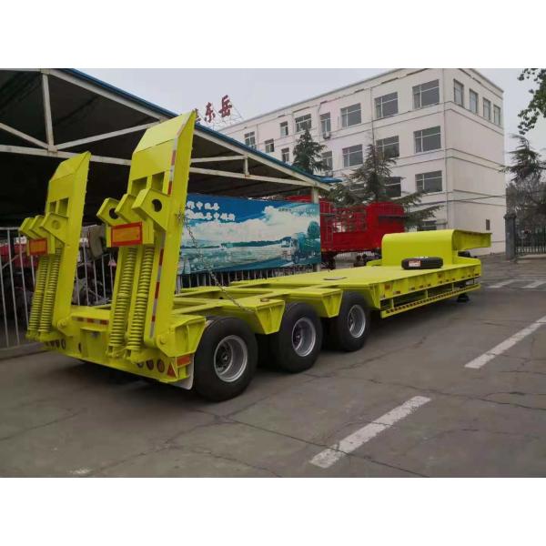 Quality Steel Or Aluminum Tri-axle 40/45/50/60 Tons Heavy-duty Transport Vehicle Low Flatbed Semi Trailer for sale