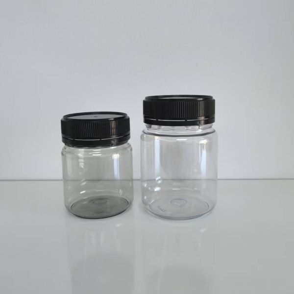 Quality Silk Screen Printing 200ml 250ml Round PET Plastic Bottle with Black Anti Theft Screw Cap Ideal Food Packaging Container for sale