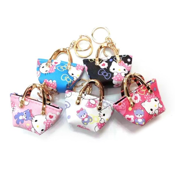 Quality Debossed Logo PU Leather Coin Holder Mini Handbag Keychain For Ornaments for sale