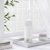 Quality 1400-1800 Times/Min Travel Size Water Flosser Electric Oral Irrigator 180ml Tank for sale