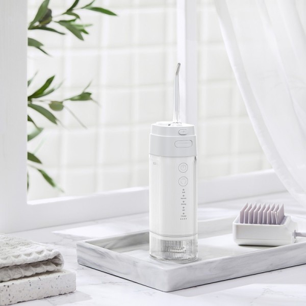 Quality 1400-1800 Times/Min Travel Size Water Flosser Electric Oral Irrigator 180ml Tank for sale