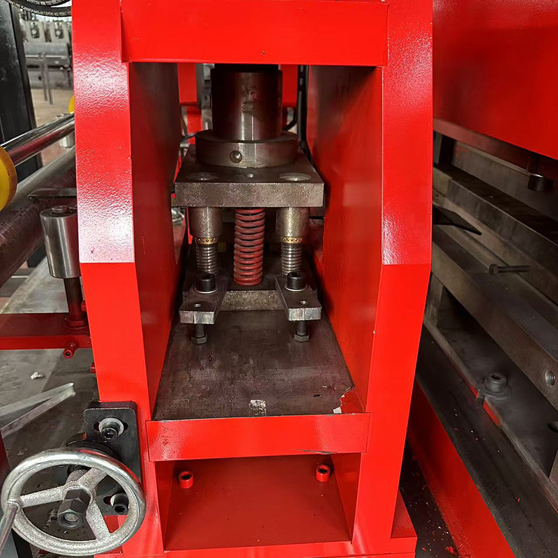 Close-up of cable tray forming mechanism