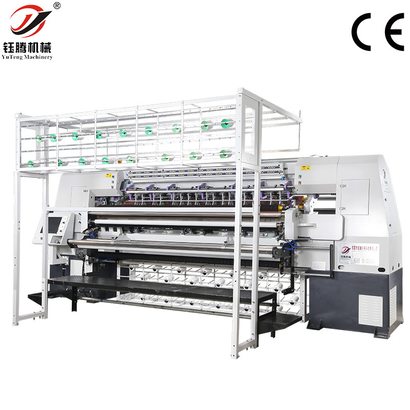 Computerized quilting and embroidery machine
