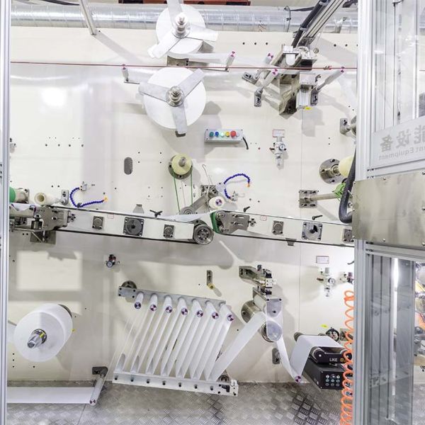 Quality Stable Work Sanitary Pad Making Machine 1200pcs/min Customizable System for sale