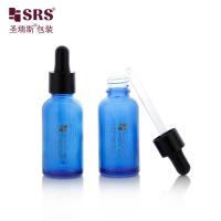 Quality D001-50ml Coating Blue Translucent Glass Essential Oil Bottle With Glossy Black for sale