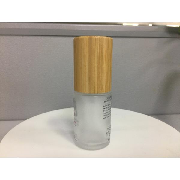 Quality SGS MSDS Bamboo Cosmetic Packaging Cylinder Glass Lotion Pump Bottle for sale
