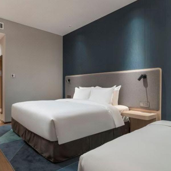Quality Fully Assembled Hotel Guest Room Furniture Packages Set Customized Shape for sale