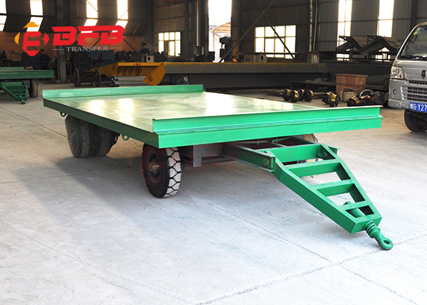 Forklift Towing Non Power Flatbed Steel Coil Trailers On Cement Floor