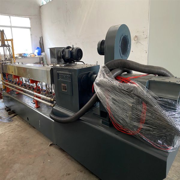 Quality Used 65-barrel twin-screw extruder for sale