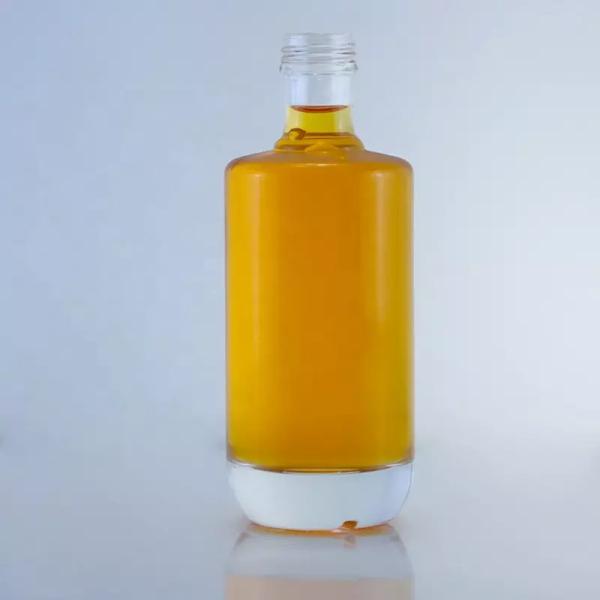 Quality Round Shape Empty Glass Bottle With Screw Cap Decal Surface for 700 ml Vodka for sale