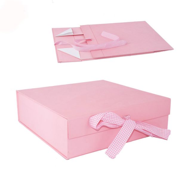 Quality Pink Magnetic C1S C2S Foldable Packaging Box With Ribbon Closure for sale