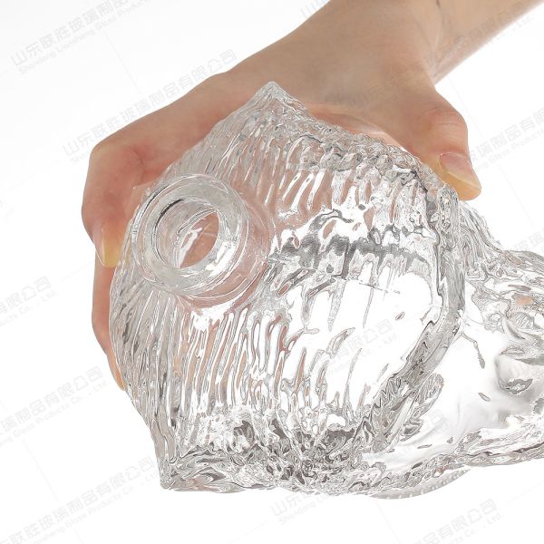 Quality Clear 1000ml Large Size Ape Head Shape Vodka Glass Bottle for Beverage Packaging for sale