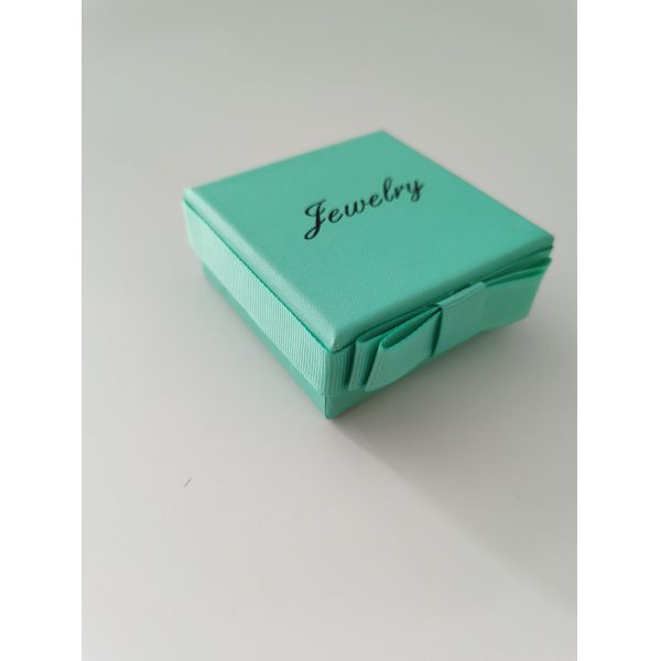 Quality Flexo Cosmetic Paper Printed Packaging Box Embossing Bright Green for sale