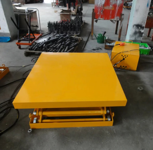 Quality Durable Stationary Hydraulic Lift Table For Warehouse Yellow for sale