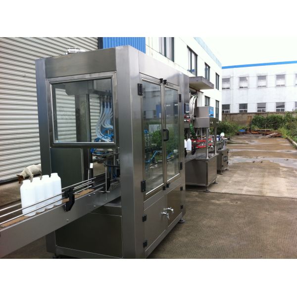 Quality Grey Inline Bottle Filling Machine SUS316L Plastic Bottle Filling Machine for sale