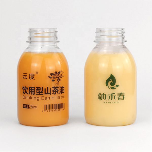 Quality Empty Airtight 250ml Plastic Juice Bottles Round PET With Cap for sale