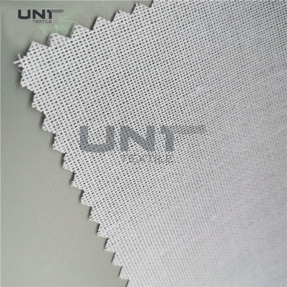 Quality Cap Resin Cotton Woven Fusible Interlining With PES LDPE Coating for sale