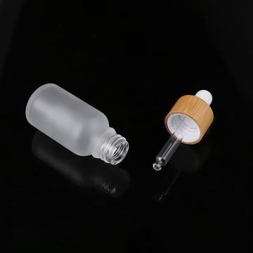 Quality Cosmetic Packaging​ 50ml Frosted Glass Bamboo Dropper Bottle for sale