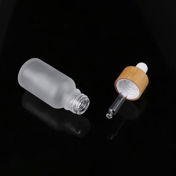 Quality Cosmetic Packaging​ 50ml Frosted Glass Bamboo Dropper Bottle for sale