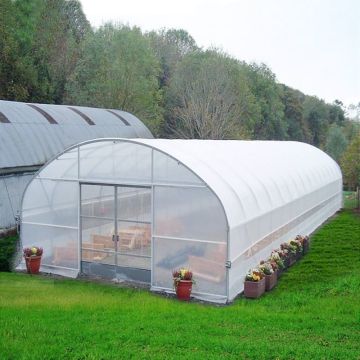 Quality 150 micro PE Film Greenhouse Ebb And Flow Rolling Bench Seedbed Greenhouse With for sale