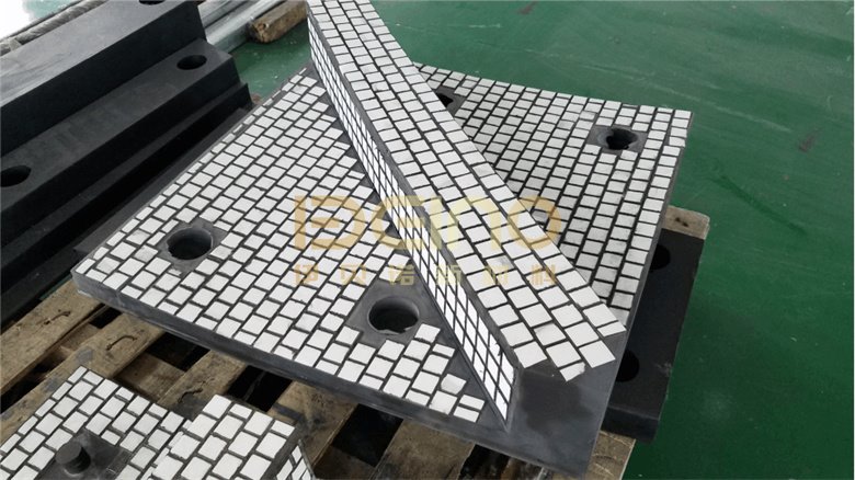 Ceramic rubber wear plate