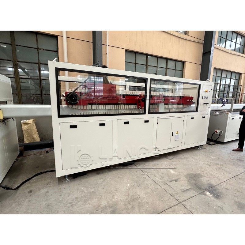 Haul-off machine with  traction system