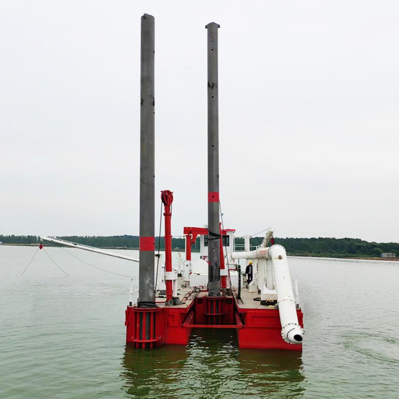 Close-up of dredger cutter head in operation