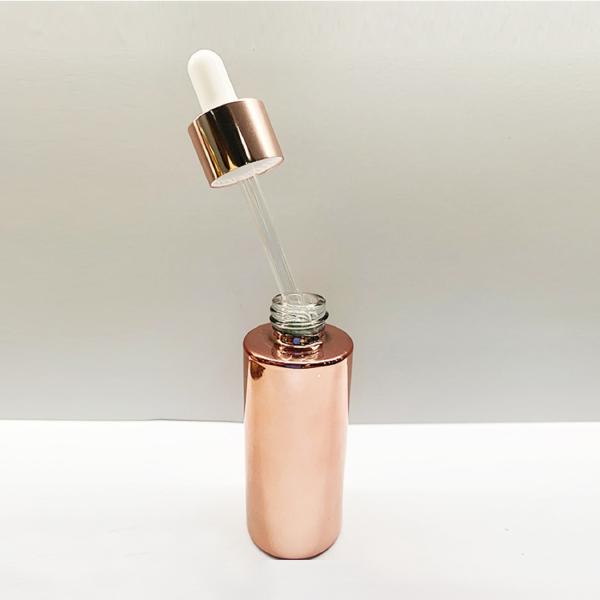 Quality OEM ODM Rose Gold Electroplating Glass Dropper Bottles Round Shape for sale