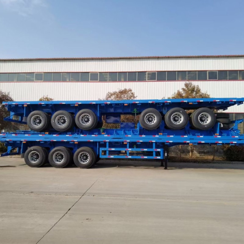 China Top Supplier 3 Axle Flatbed/Platform Semi Trailer for 20 FT/40FT/45FT Container Cargo Transport