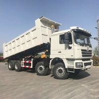 Quality Shacman 8X4 Dump Trucks for Heavy Machine LHD Cargo Tank Dimension 6800*2350 for sale