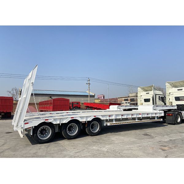 Quality High Strength 3 Axle Low Bed Trailer 70 To100 Tons For Self Dumping for sale